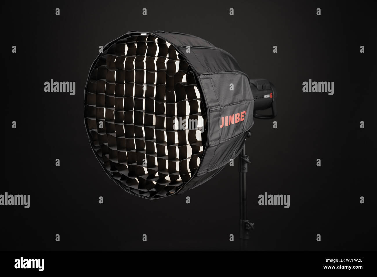 A modern electric saturated black octobox on a tripod. A huge octobox ...