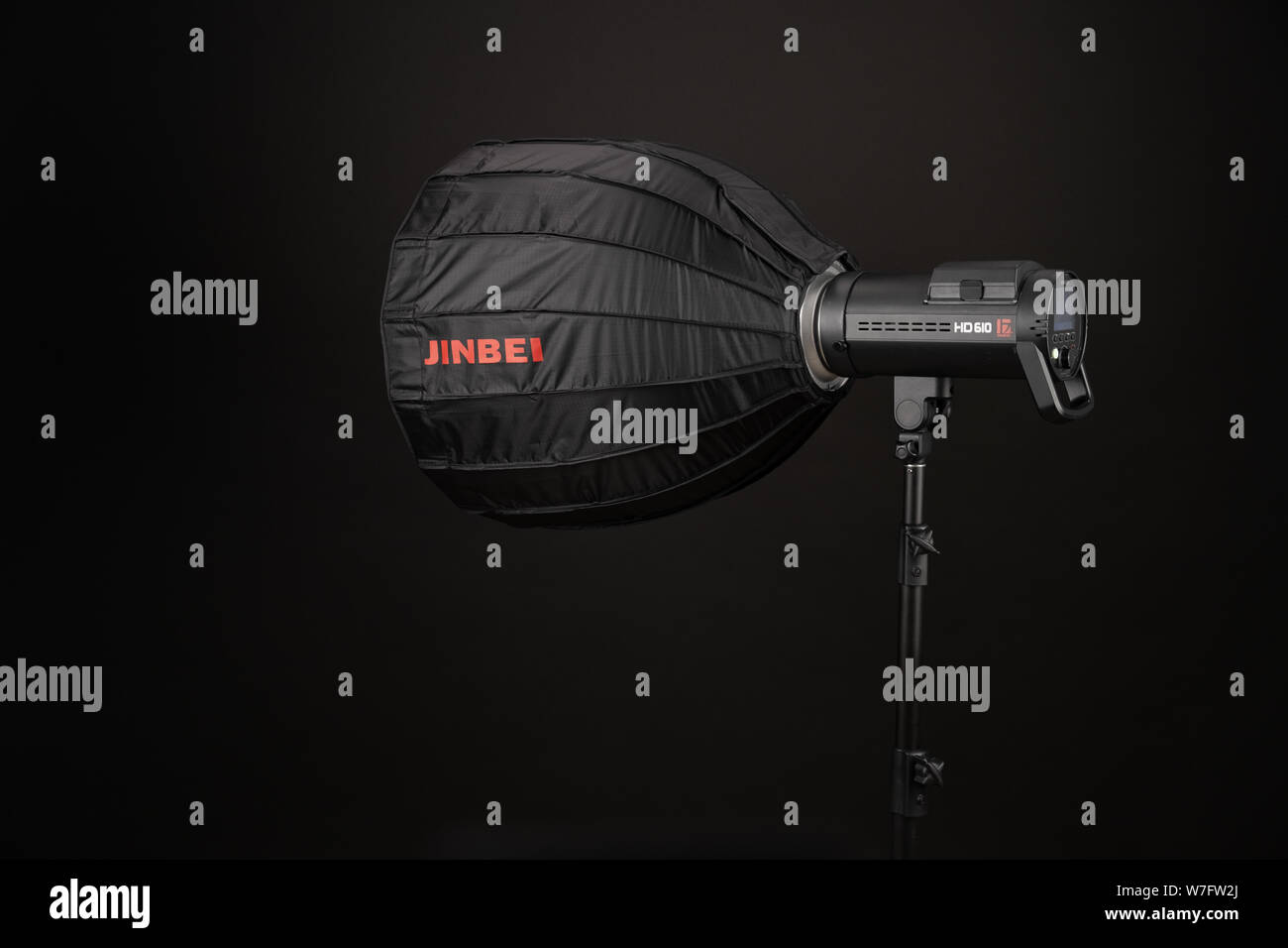 A modern electric saturated black octobox on a tripod. A huge octobox ...