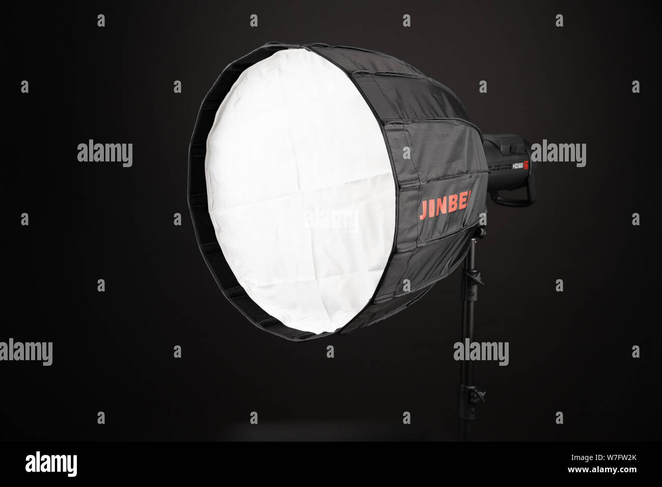 A modern electric saturated black octobox on a tripod. A huge octobox ...