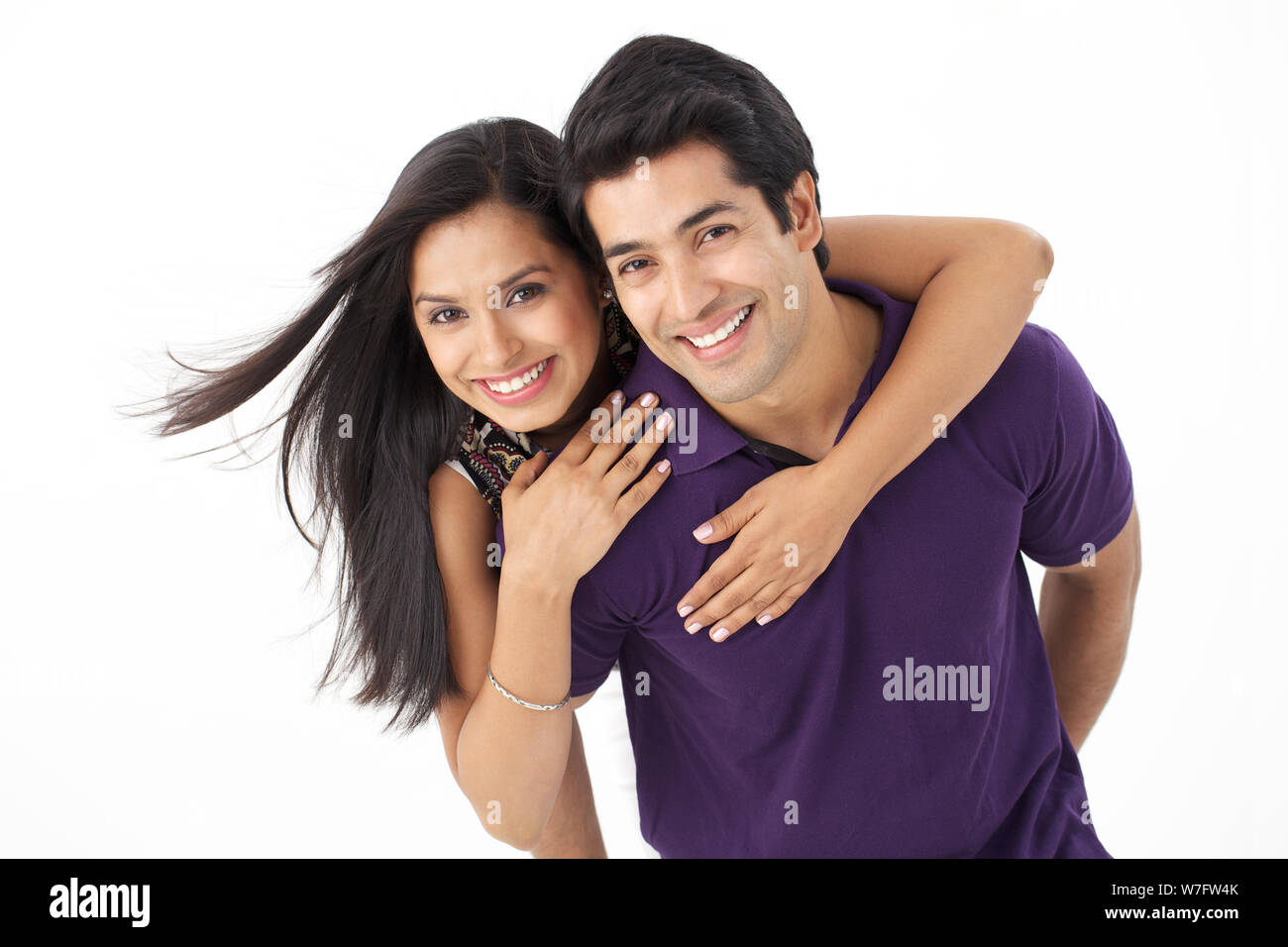 Woman Hugging Man From Behind Cut Out Stock Images & Pictures - Alamy