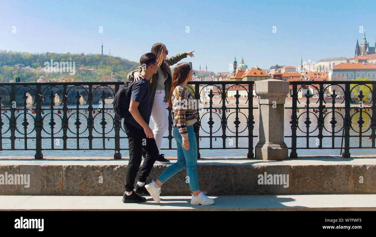 Three friends walking bridge hi-res stock photography and images - Alamy