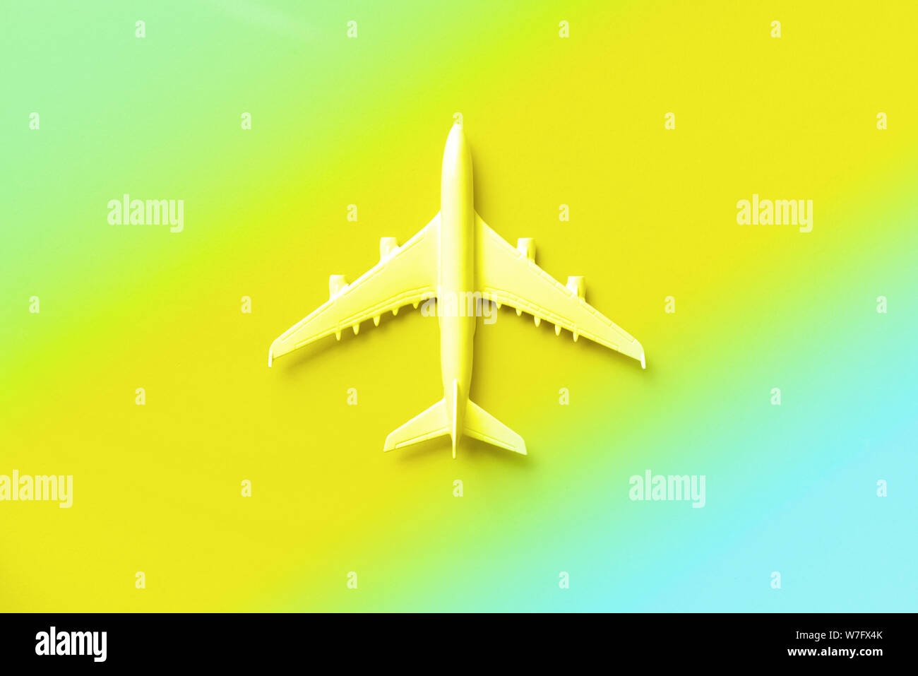 White plane, airplane in trendy neon colors. Rainbow gradient ...