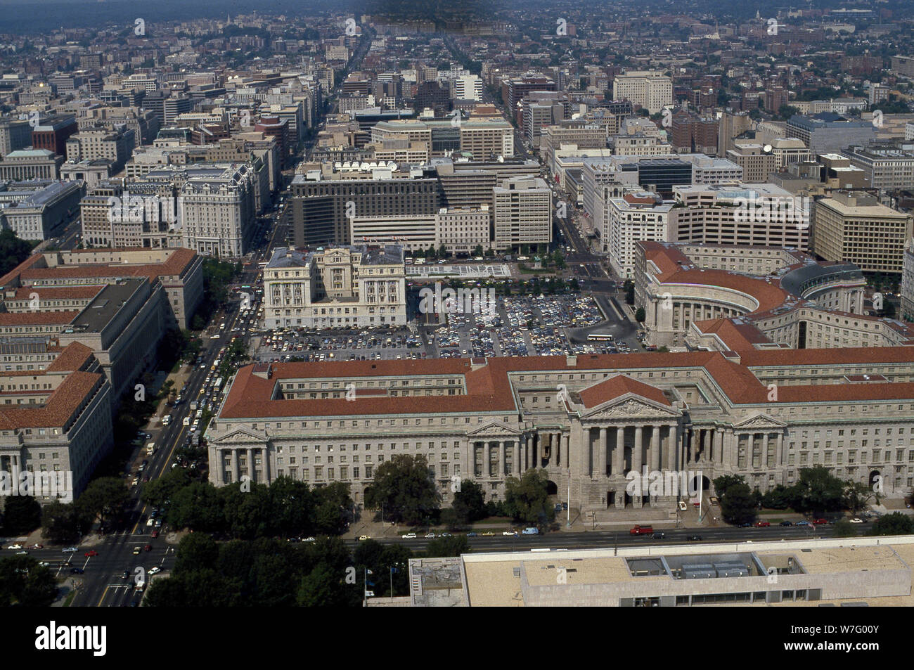 Aerial view with a focus on the red-roofed federal buildings of the ...