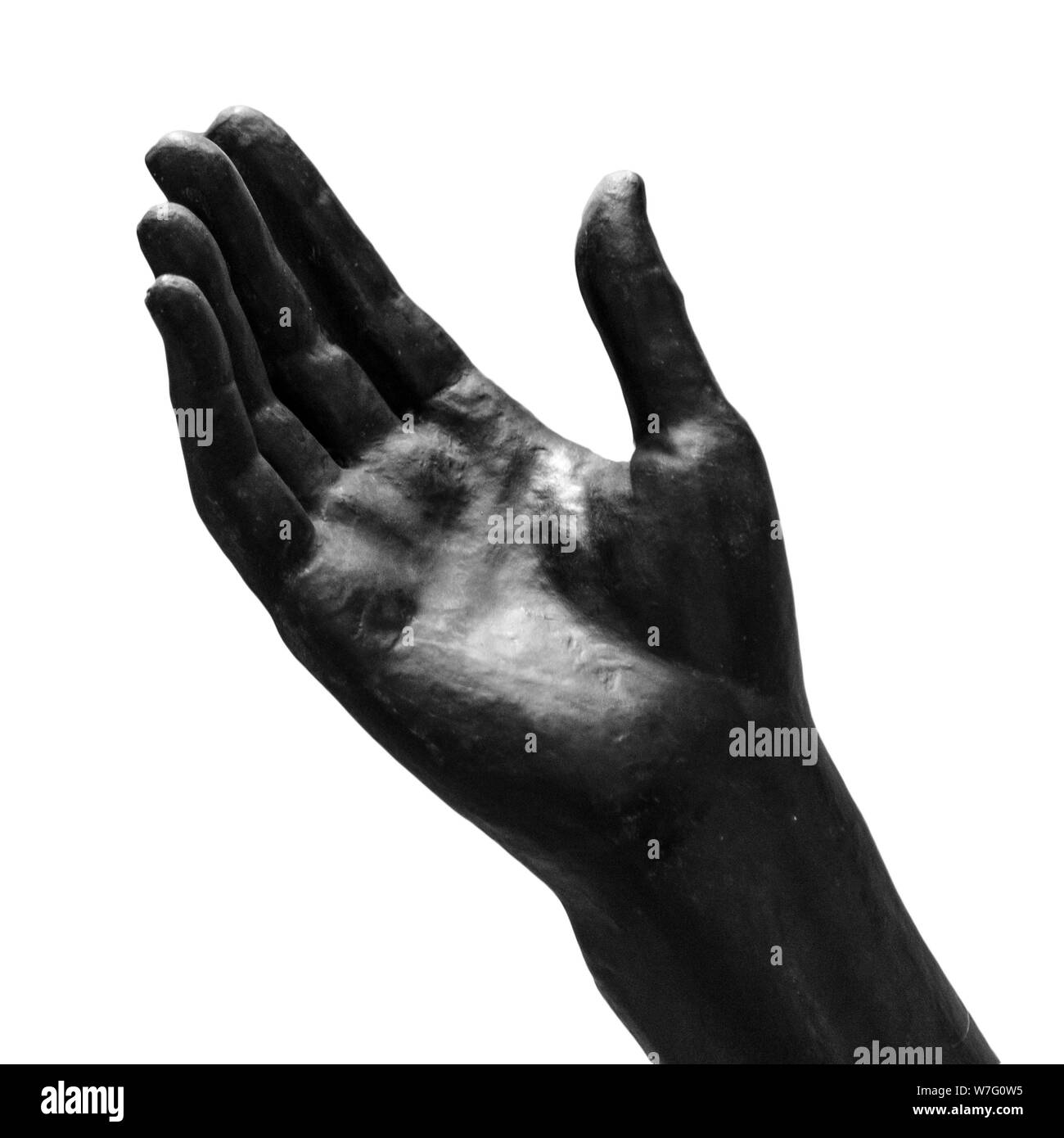 Black stone statue hand on white background Stock Photo - Alamy
