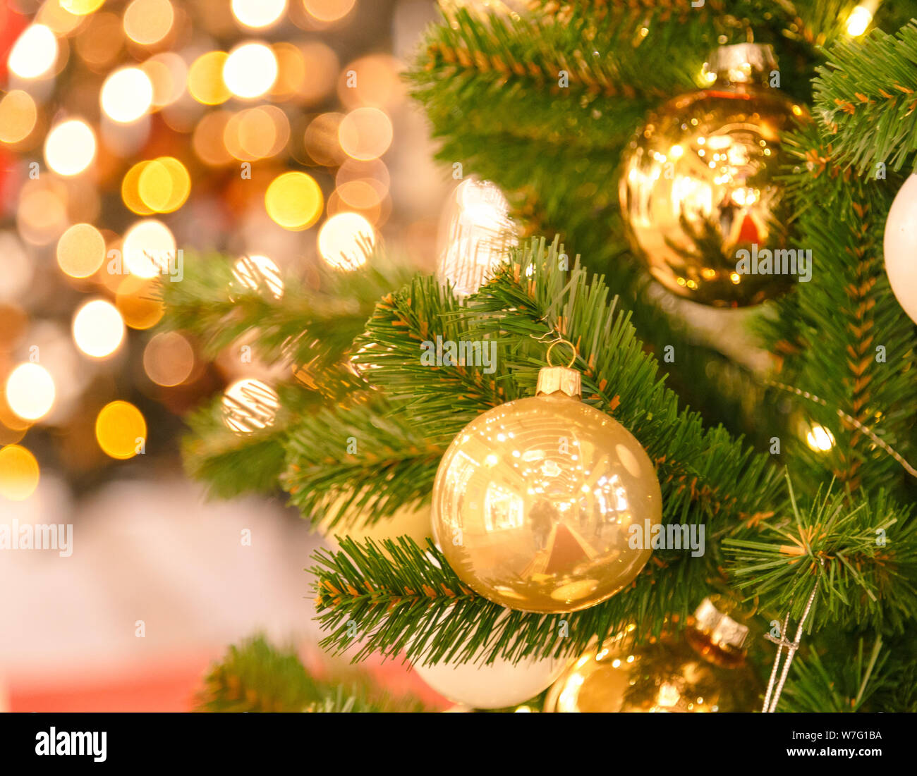 Christmas scene with tree gifts and fire in background Stock Photo - Alamy