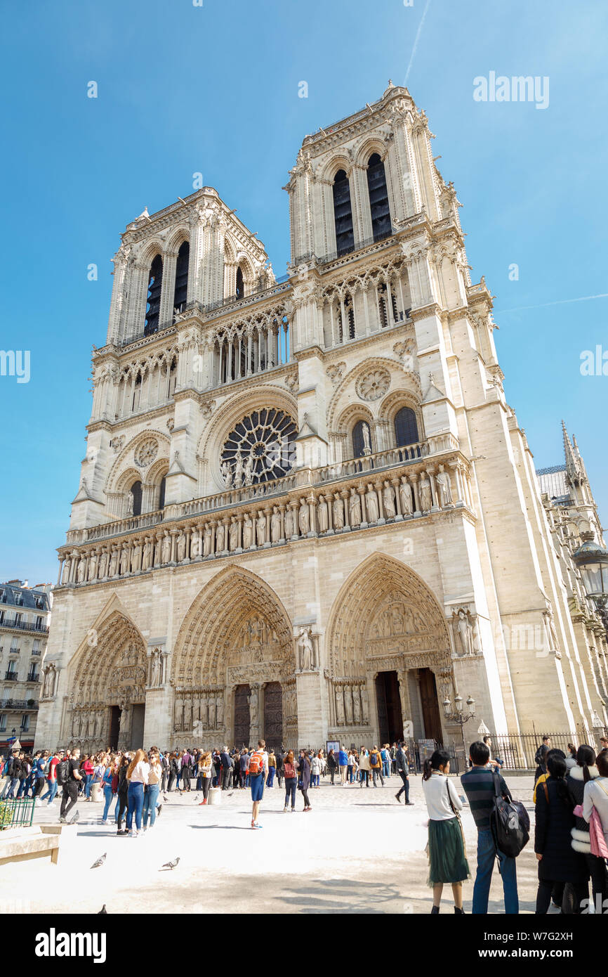 Paris, France, March 27 2017: Tourists visiting the Cathedrale Notre ...