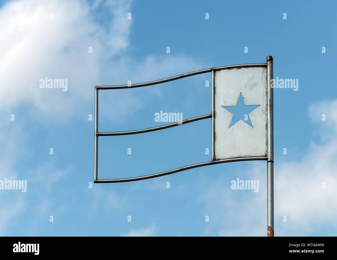 An unusual representation of the lone-star Texas State Flag, minus its ...