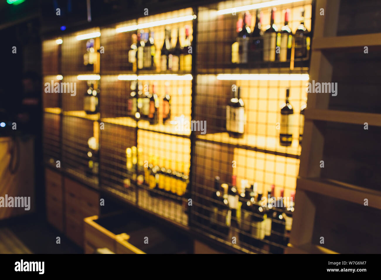 Blurred image of liquor shop for background uses Stock Photo - Alamy