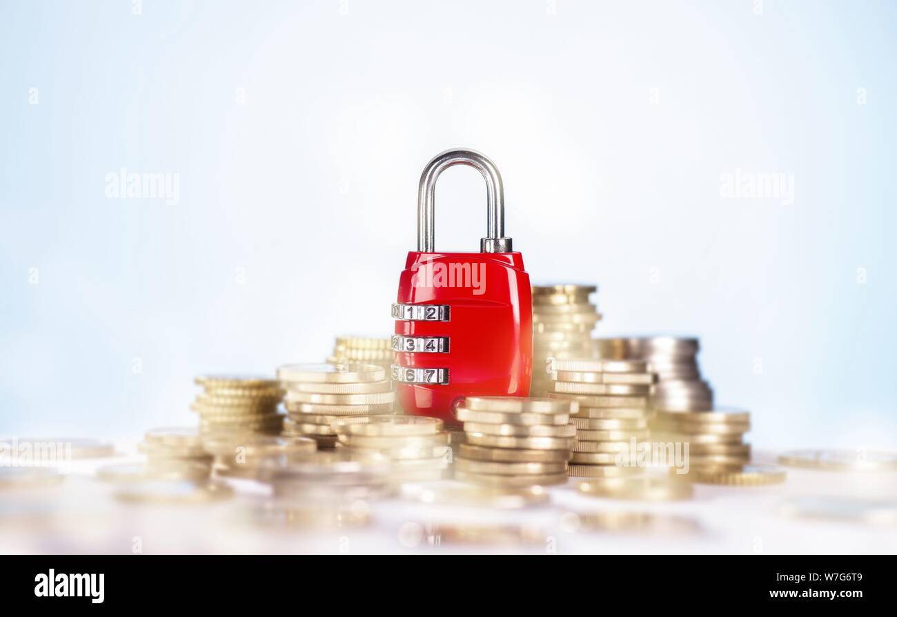 Combination lock with several stacks of coins | usage worldwide Stock ...