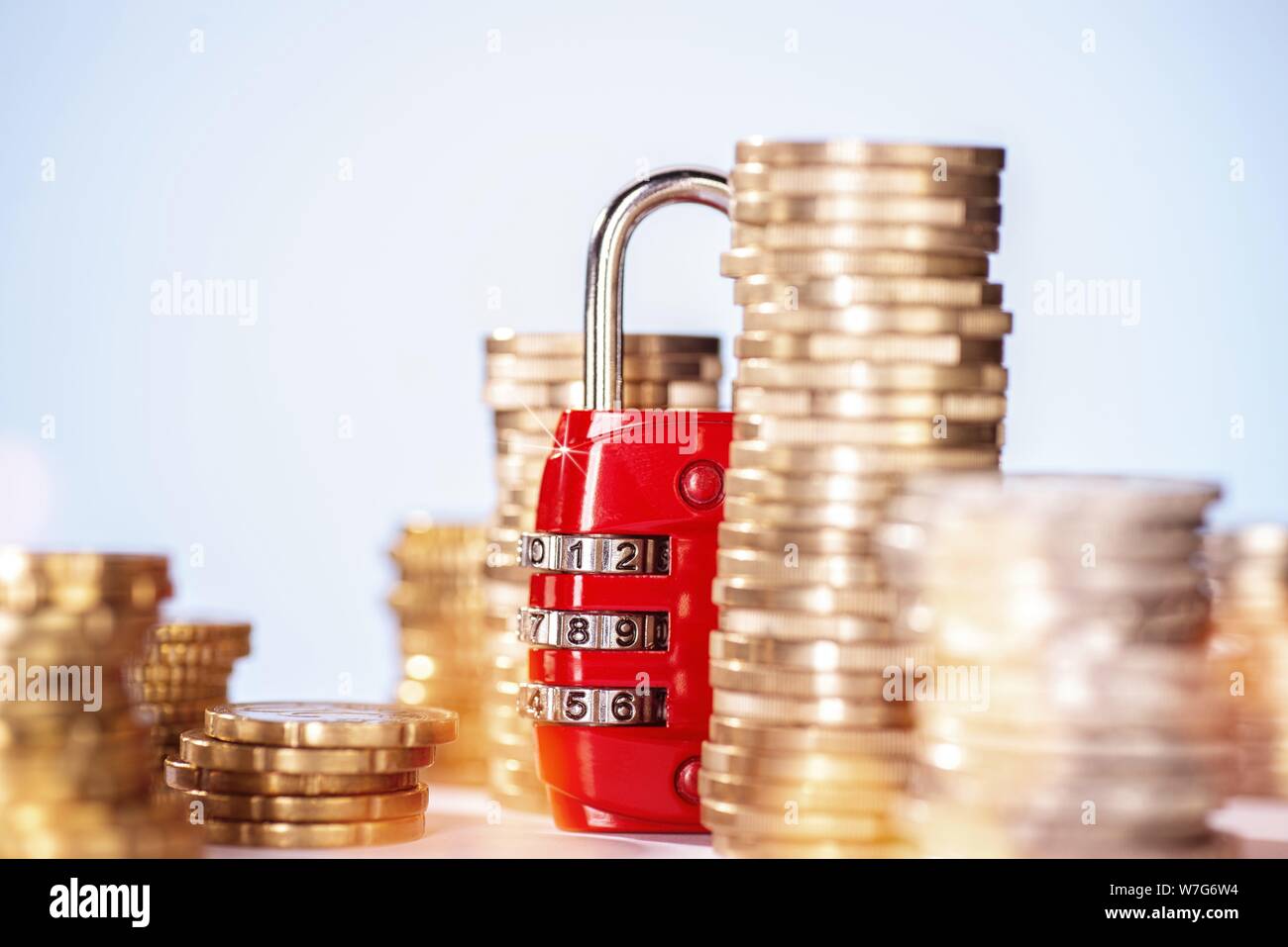 Combination lock with several stacks of coins | usage worldwide Stock ...