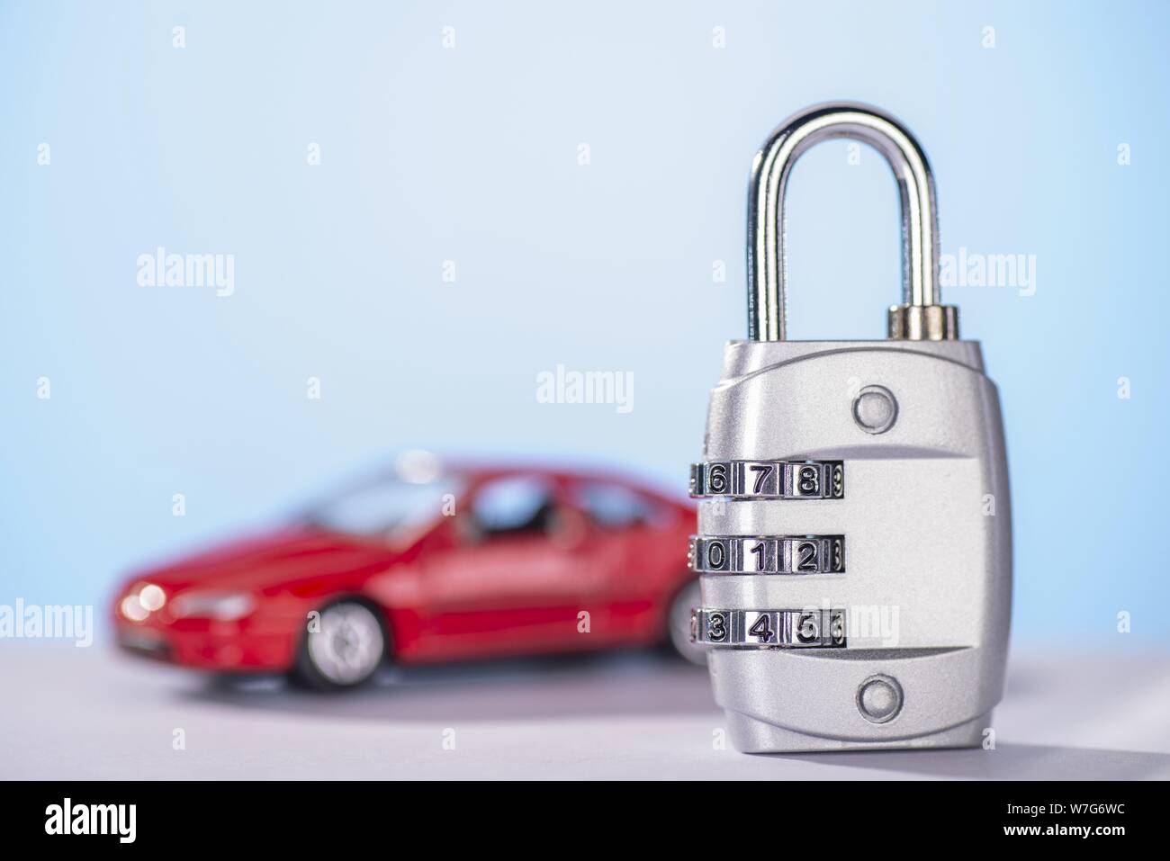Combination lock with car in the background | usage worldwide Stock ...