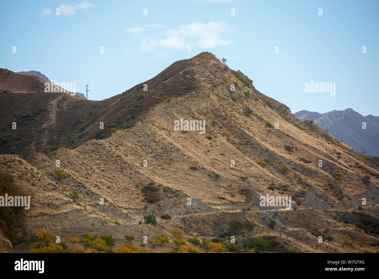 Picture of picturesque mountain terrain, blue sky with clouds Stock ...