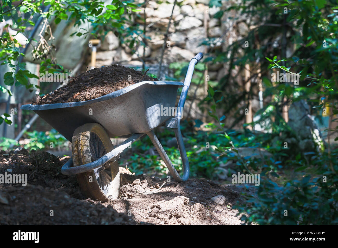 Push soil hi-res stock photography and images - Alamy