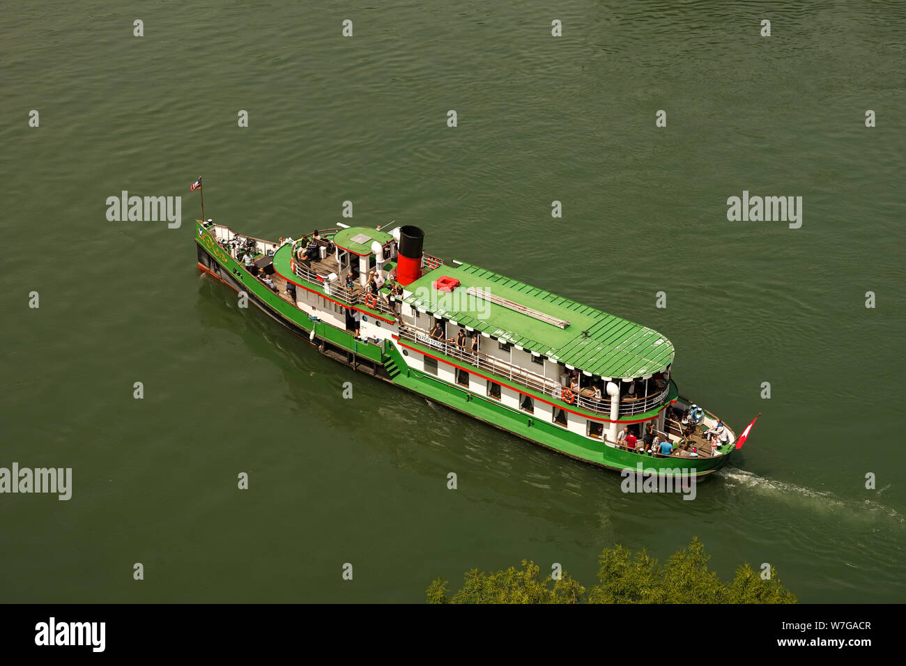 Basler Dybli, a boat for tourists on the river Rhine in Basel ...