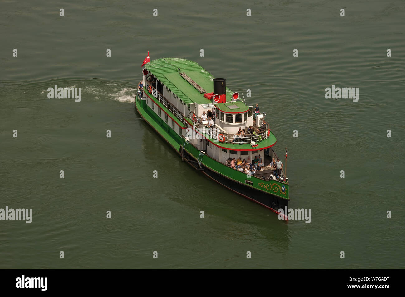 Basler Dybli, a boat for tourists on the river Rhine in Basel ...