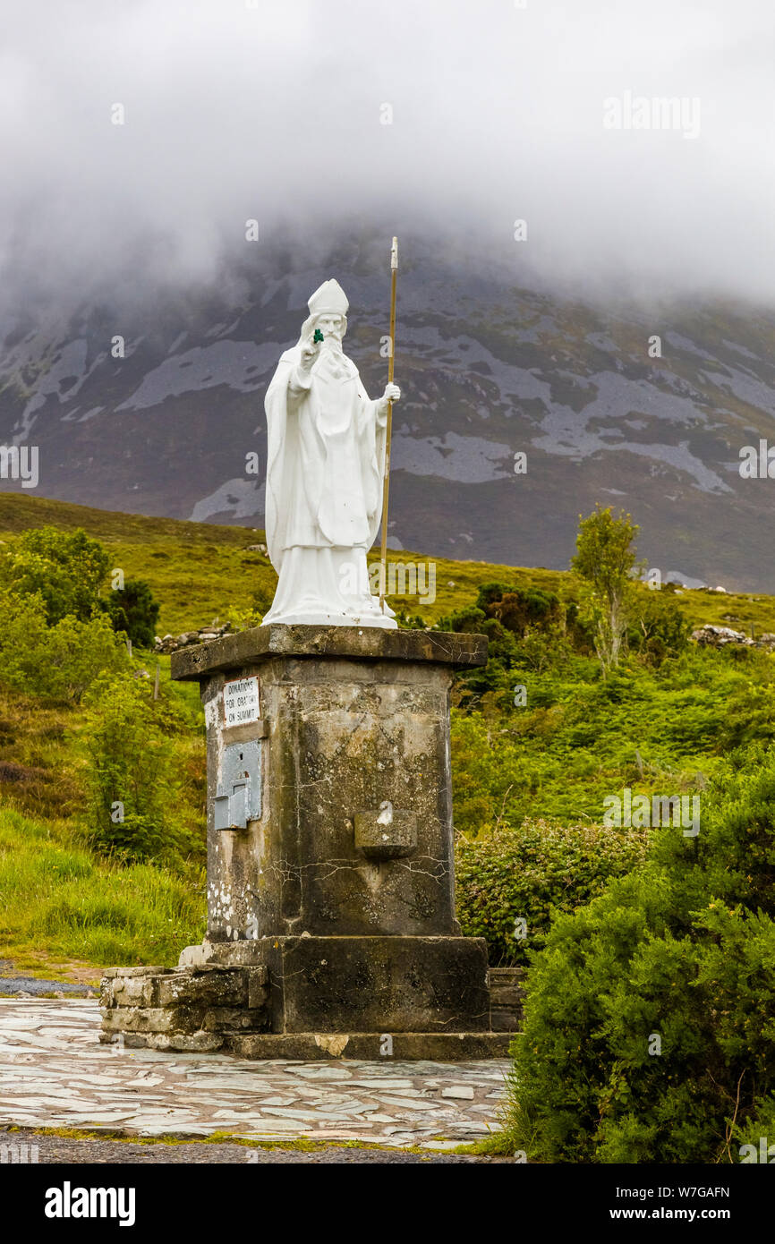 Statue of St Patrick on the trail up Irelands Holy Mountain Croagh ...