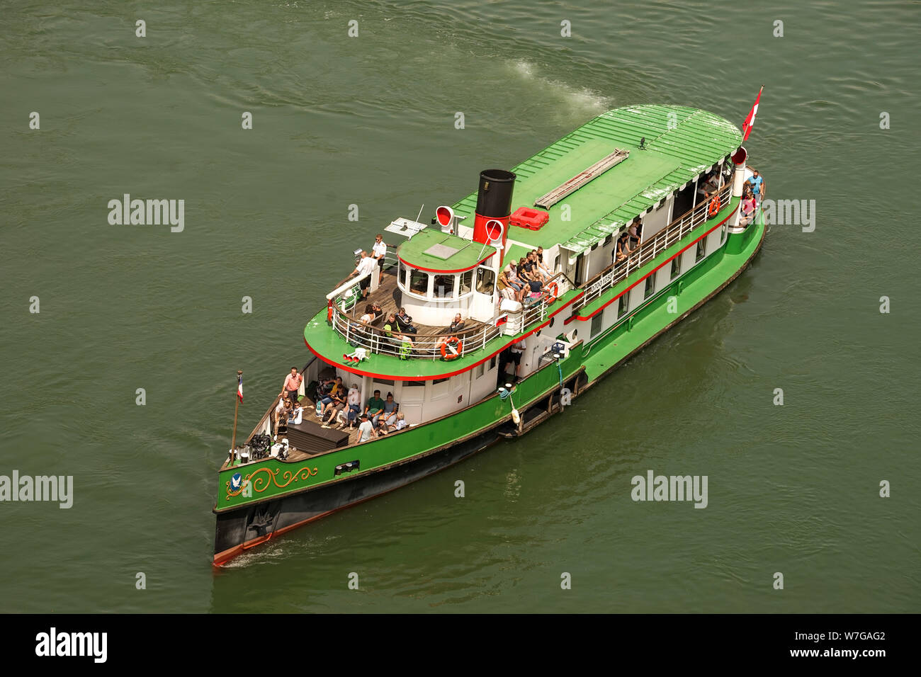 Basler Dybli, a boat for tourists on the river Rhine in Basel ...