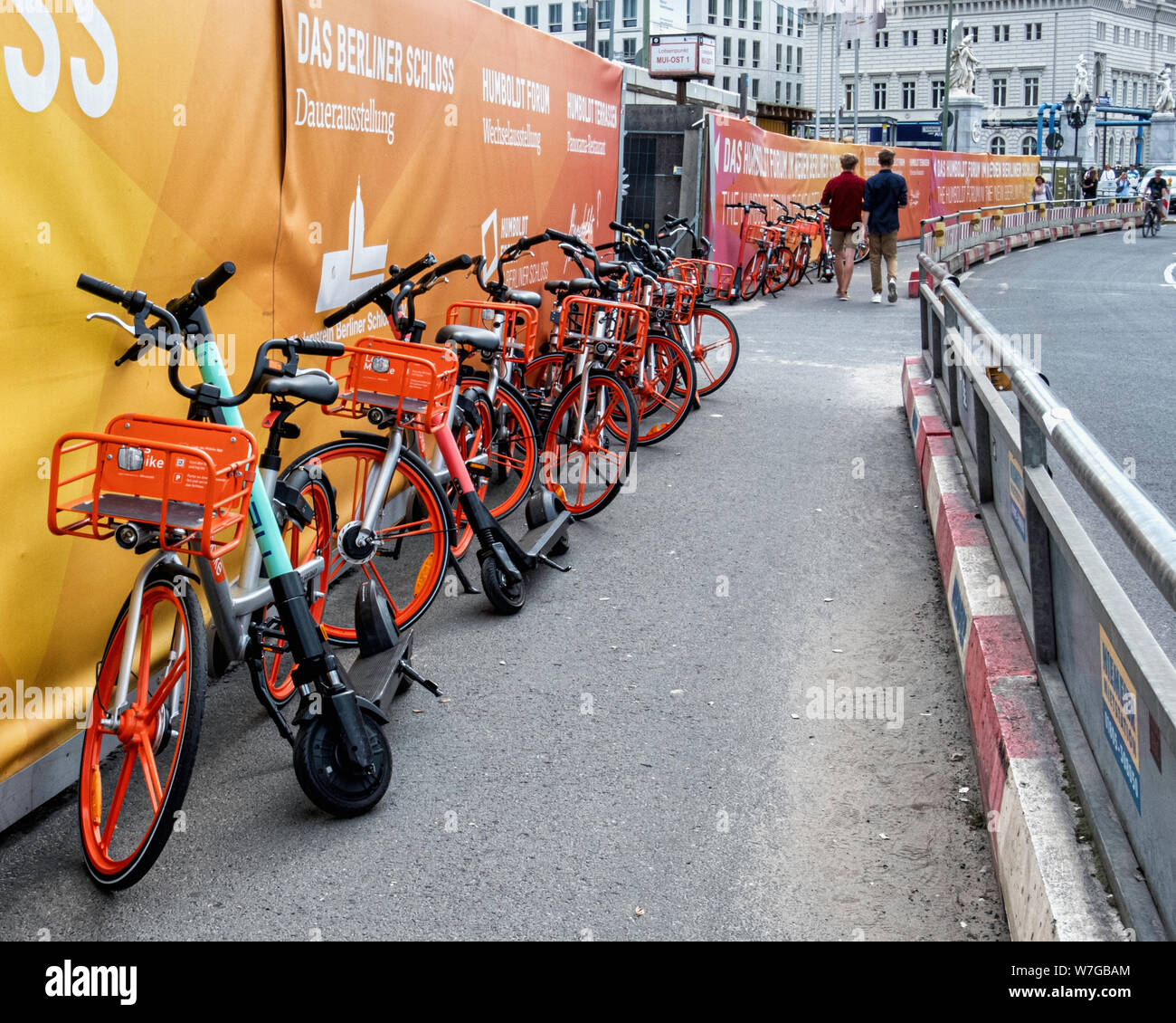 Electric two wheelers. E-scooters and battery-powered bikes clutter the ...