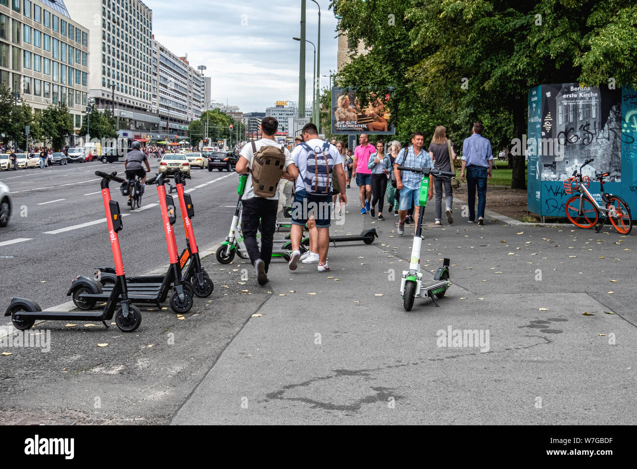 Electric two wheelers. E-scooters and battery-powered bikes clutter the ...