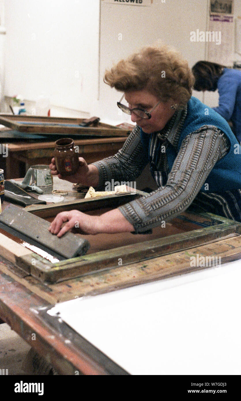 1970s, a lady in a workshop doing screen printing, England, UK Stock ...