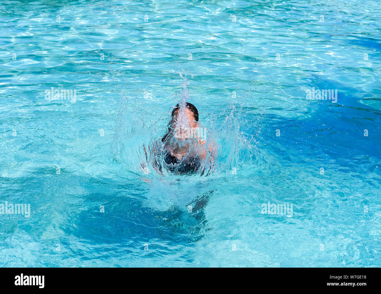 Water splashing into pool hi-res stock photography and images - Alamy