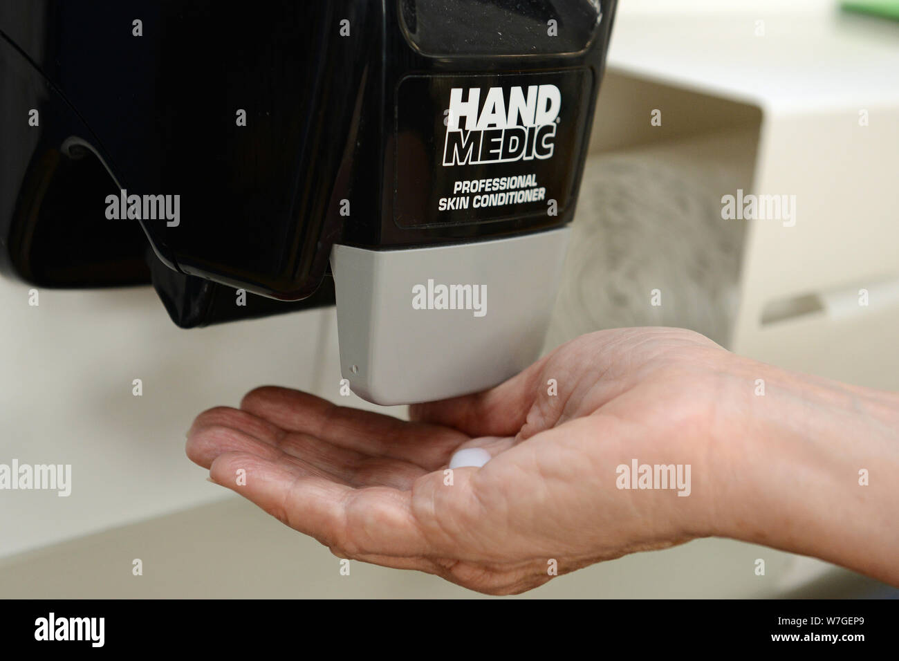Hospital hand sanitiser dispenser Stock Photo - Alamy