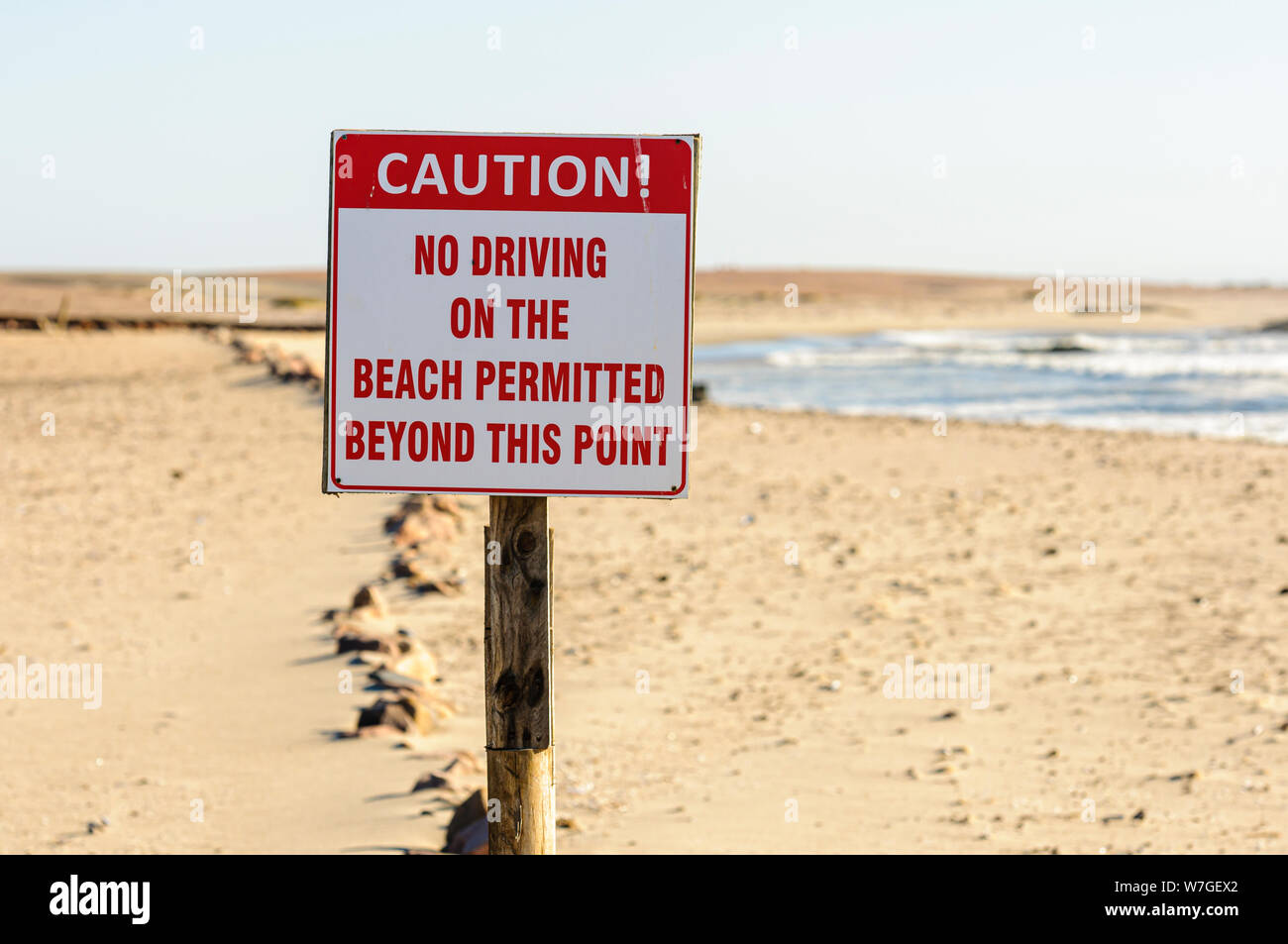 Sign saying "Caution! No driving on the beach permitted beyond this ...