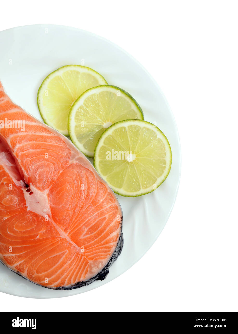salmon fish and lemon on dish isolate on white background Stock Photo ...