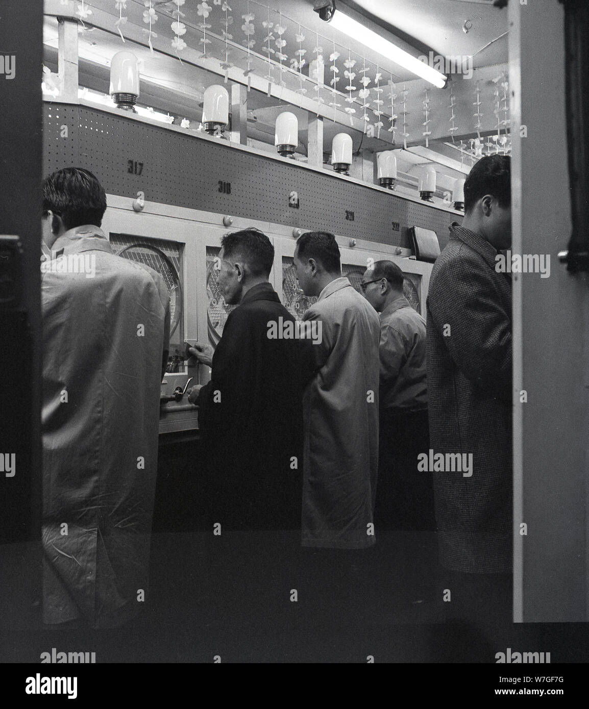 1960s, historical, japanese man playing ?? in Tokyo, Japan Stock Photo ...