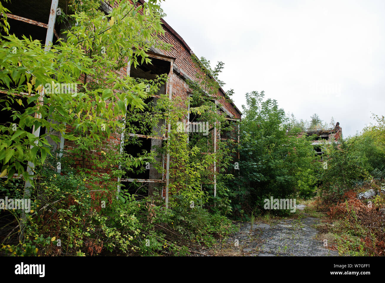 Industrial exterior of an old abandoned factory Stock Photo - Alamy