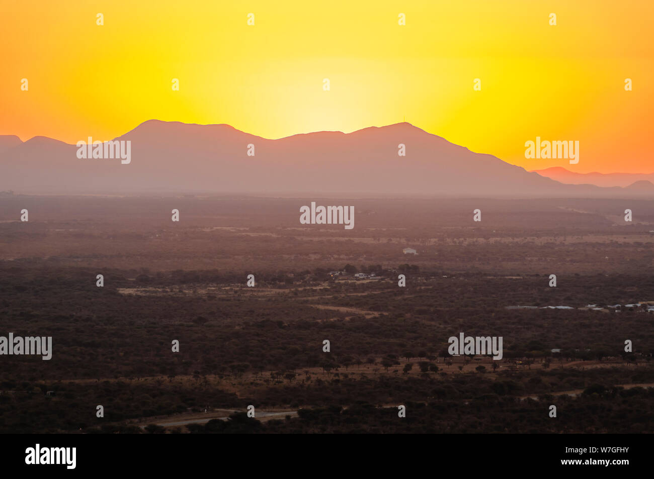 African sunset behind mountains from Otjiwarongo, Namibia Stock Photo ...