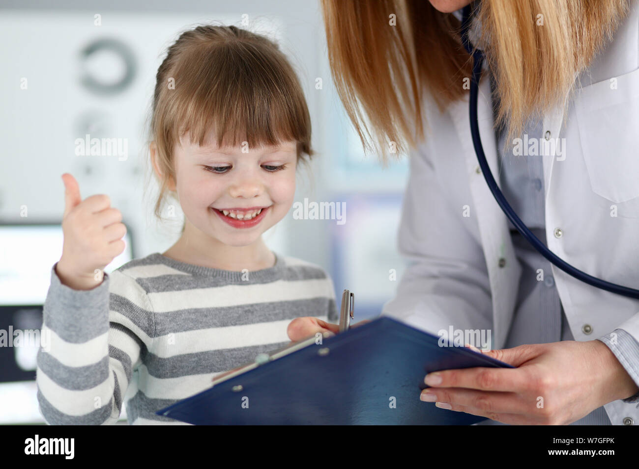 Cheerful kid patient with pediatrician Stock Photo - Alamy