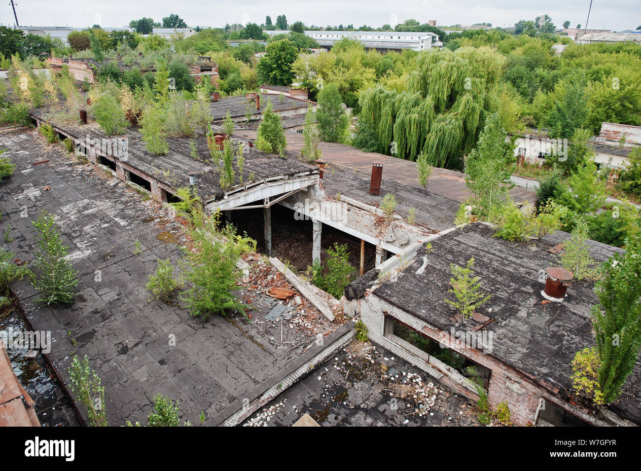 Industria exterior of an roof old abandoned factory Stock Photo - Alamy
