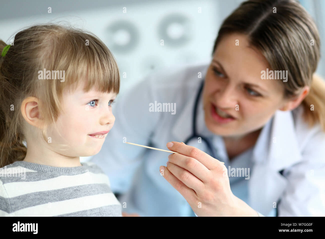 Smart female doctor and child Stock Photo - Alamy
