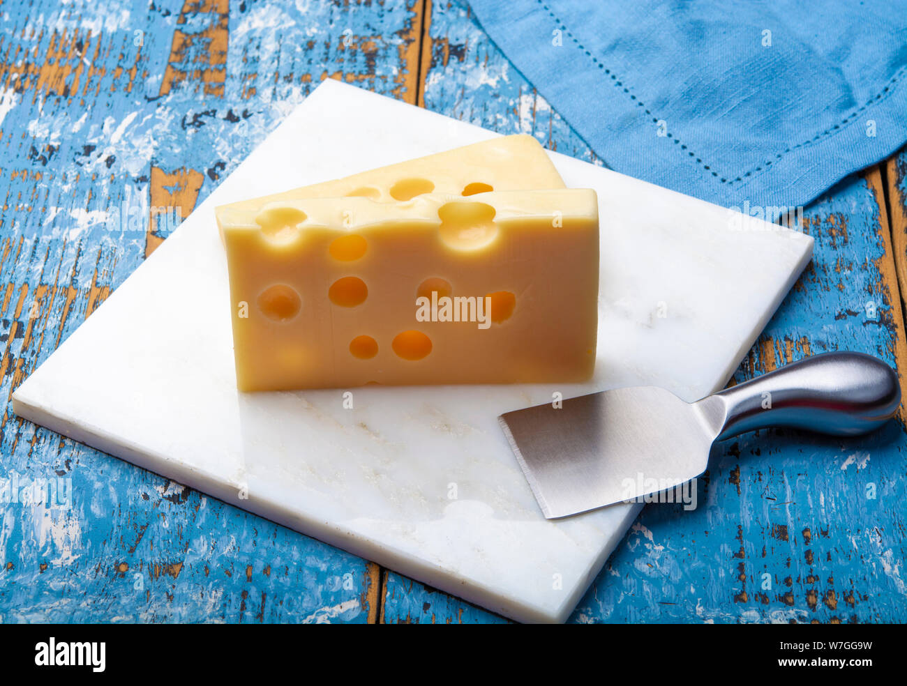 Two blocks of French emmental semi-hard cheese close up Stock Photo - Alamy