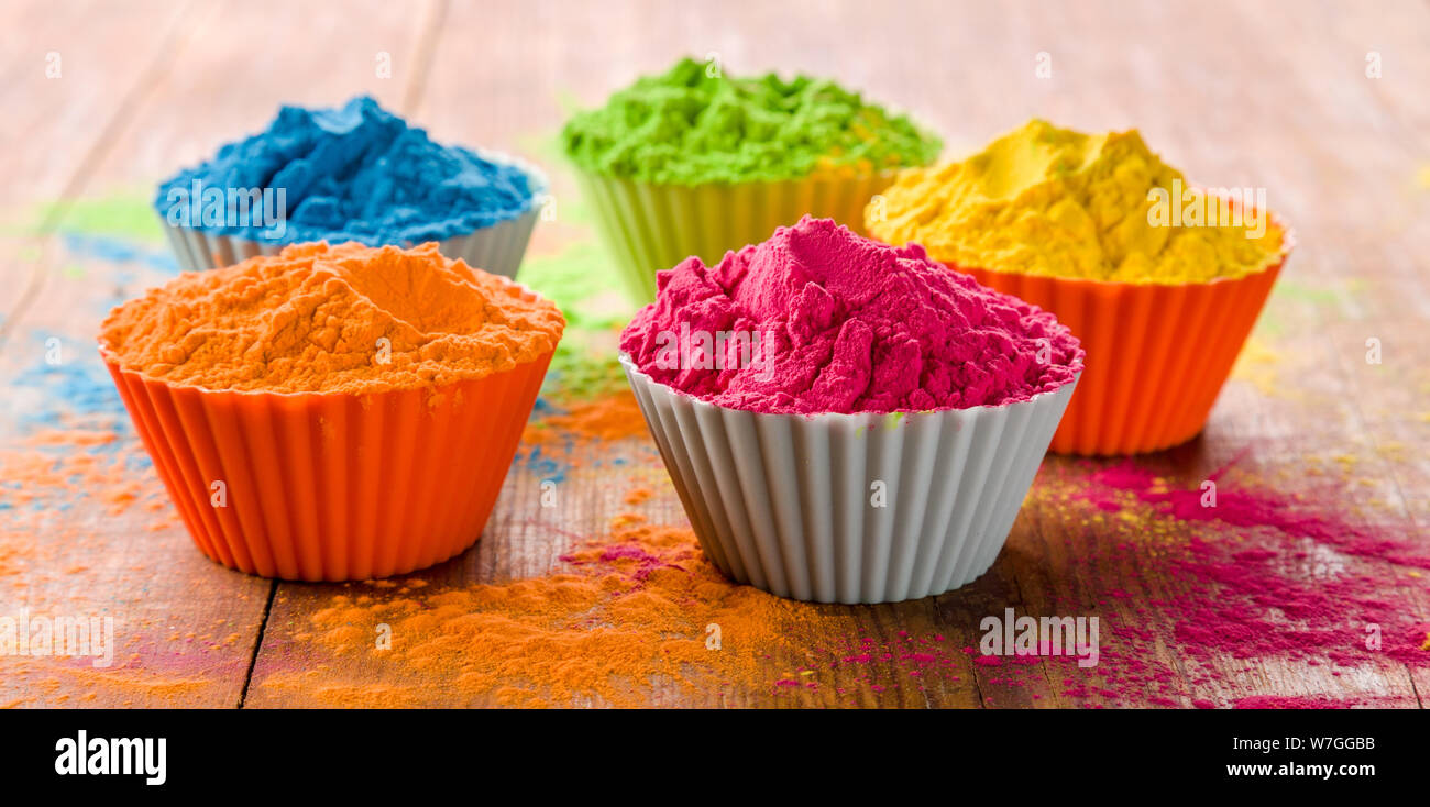 Holi color powder. Organic Gulal colours in bowl for Holi festival ...