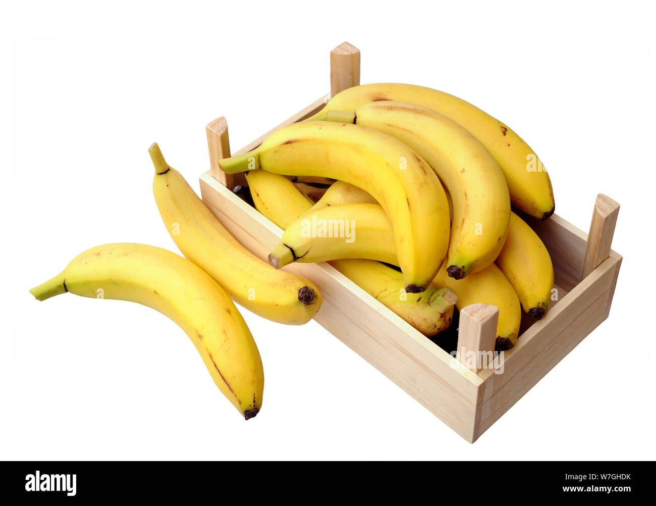 a lot of godlen banana in wooden case on white Stock Photo - Alamy