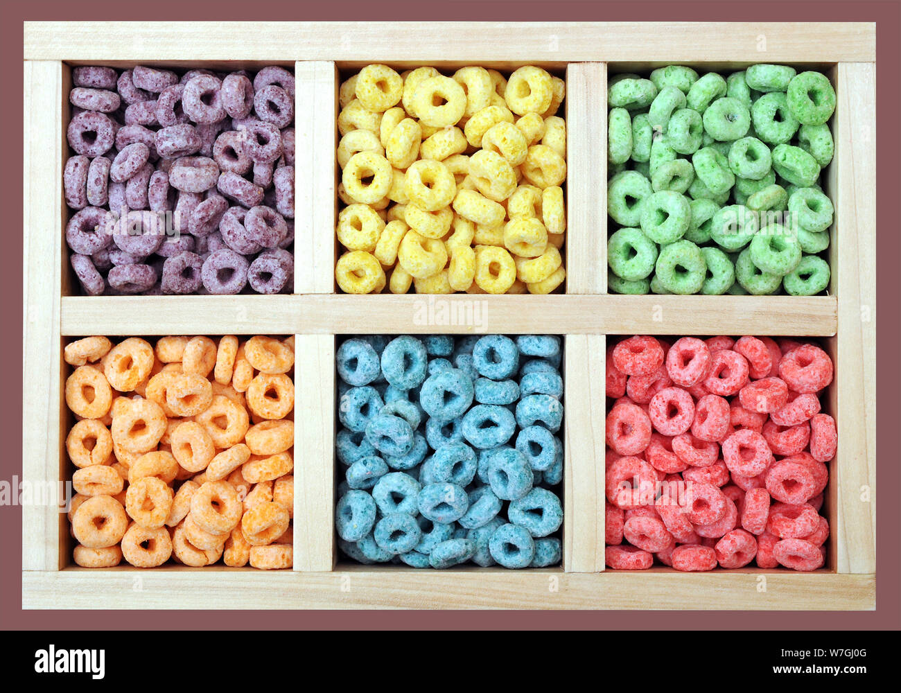 six colorful cereals in wooden box Stock Photo - Alamy