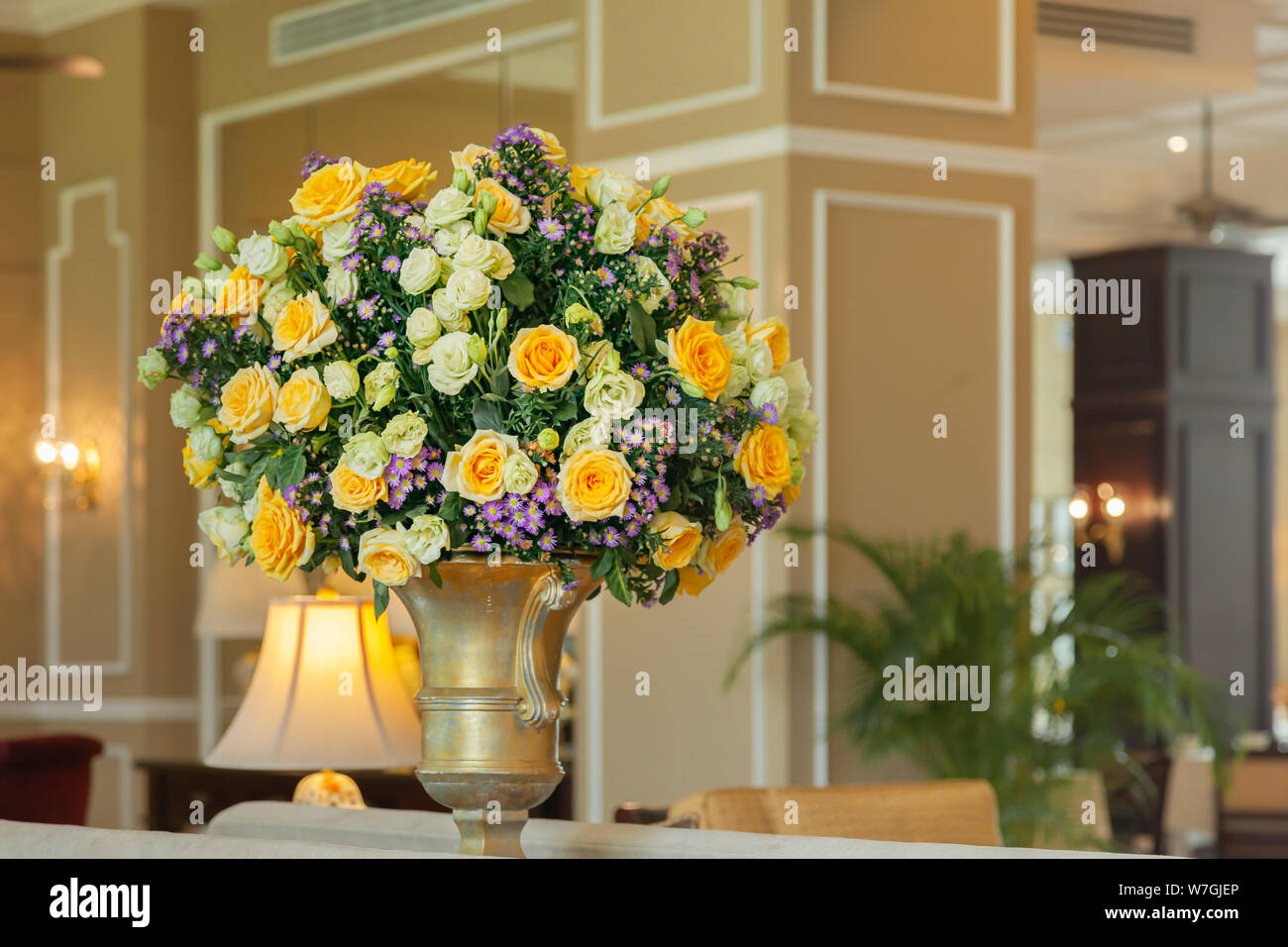 Floral display in colonial hotel Stock Photo - Alamy