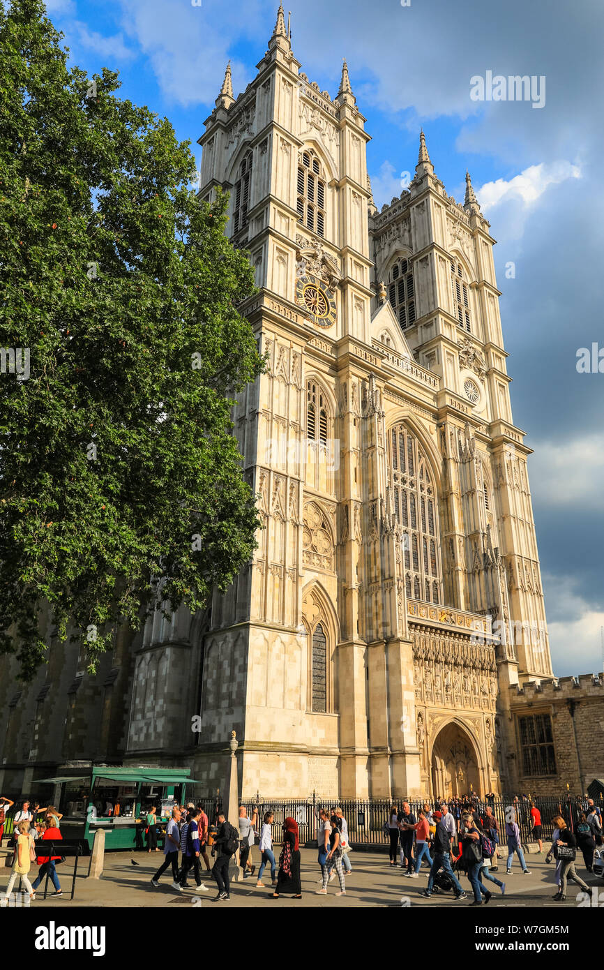 Westminster Abbey exterior, people walking, front view, London, UK ...