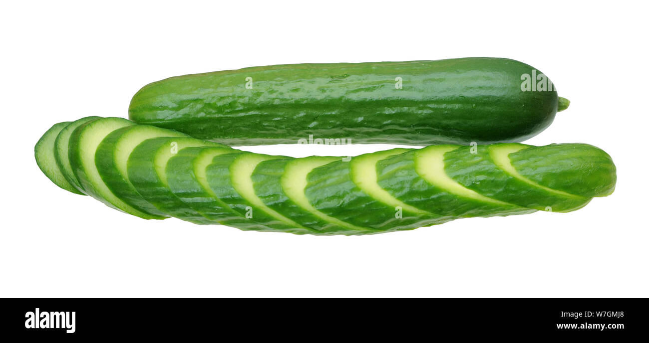 sliced and whole cucumbers isolated on white background Stock Photo - Alamy