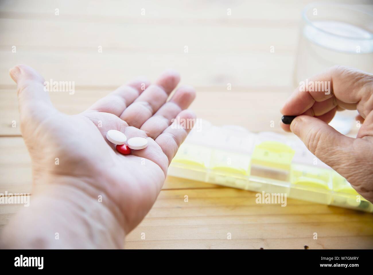 Old lady prepare to eat daily medicine pill - people healthcare with ...