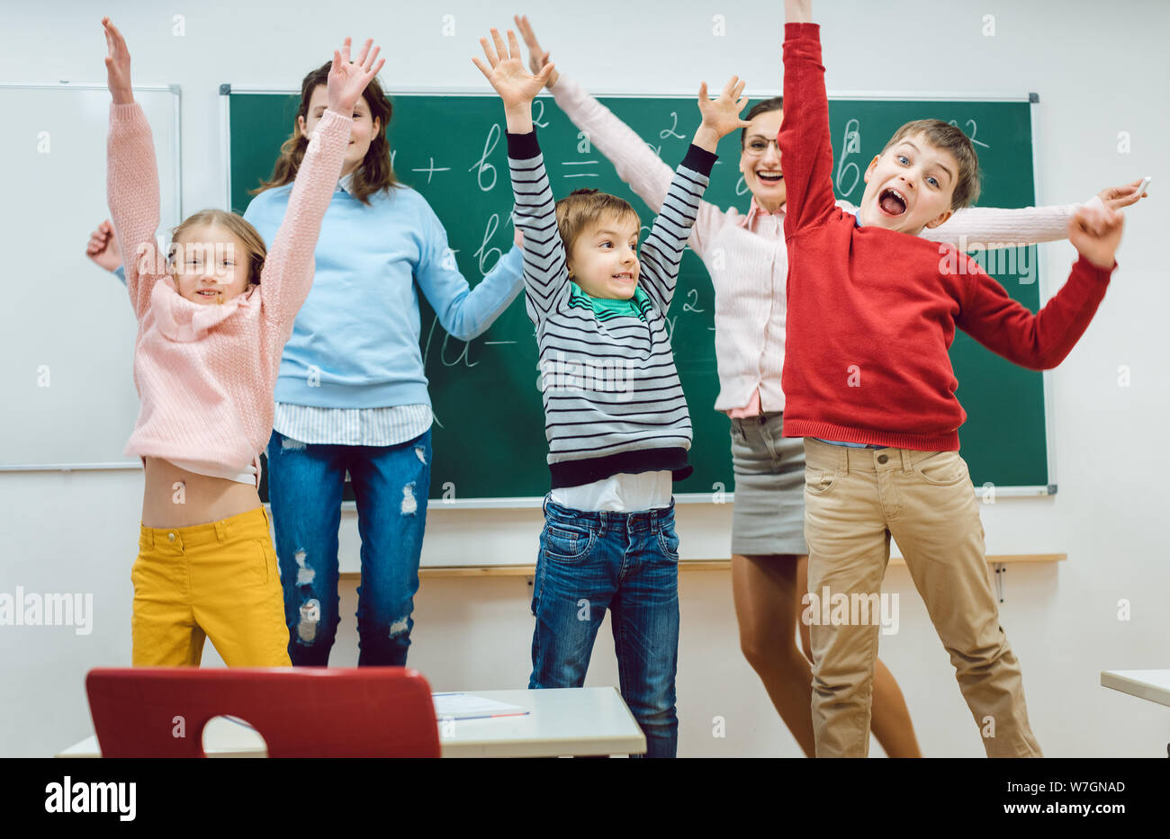 Children jumping school elementary hi-res stock photography and images - Alamy