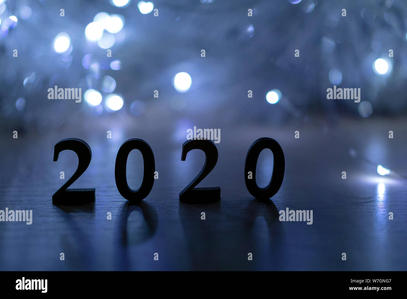 2020 Happy New Year. Silhouette of the number 2020 backlit by a ...