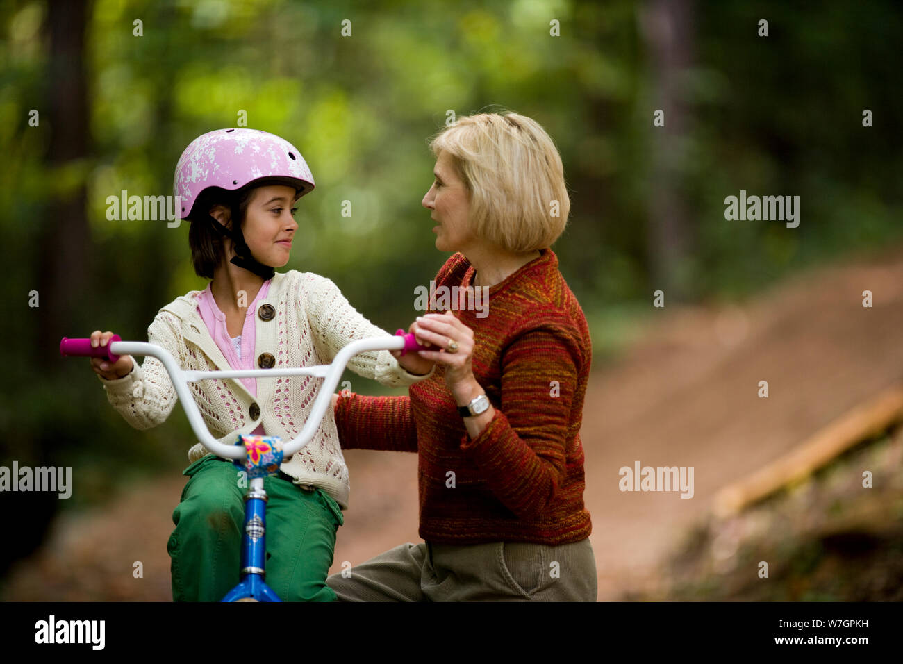 Grandmother children bike hi-res stock photography and images - Alamy