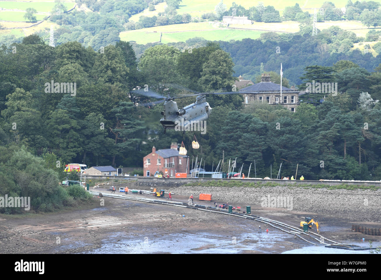 Work continues to shore up the dam at Toddbrook Reservoir near the ...