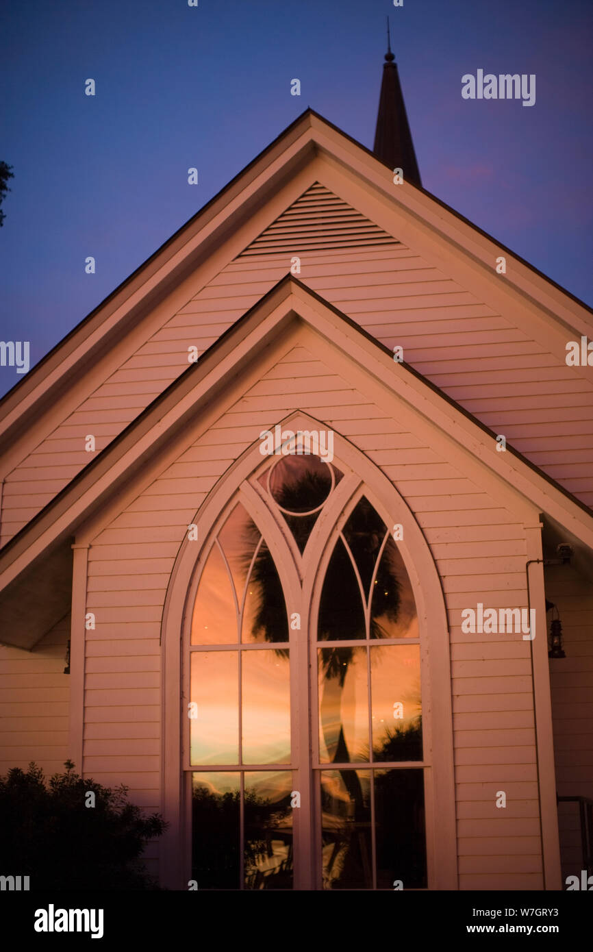 Sunset reflected in church windows Stock Photo - Alamy