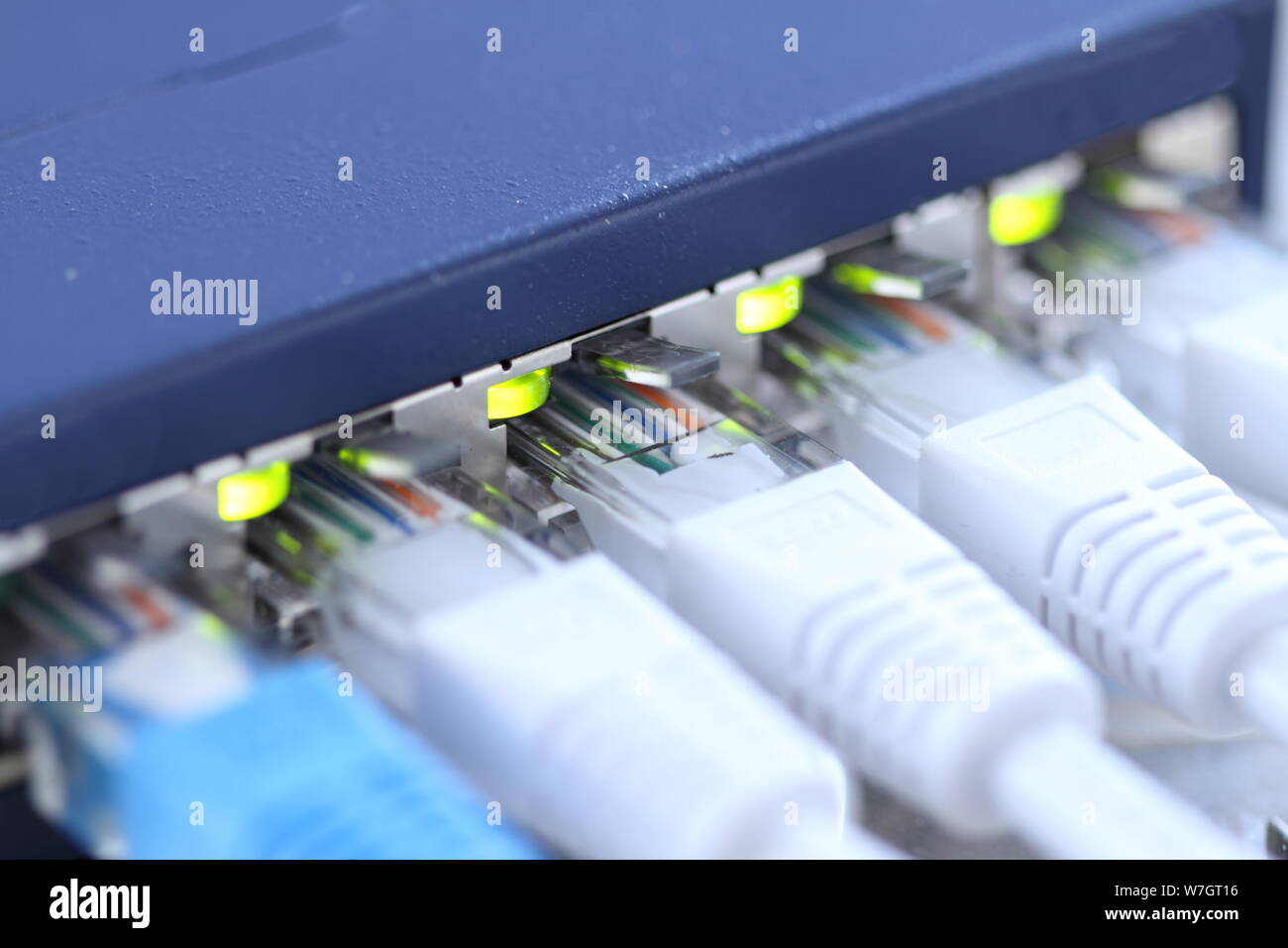 RJ45 plug in a router Stock Photo - Alamy