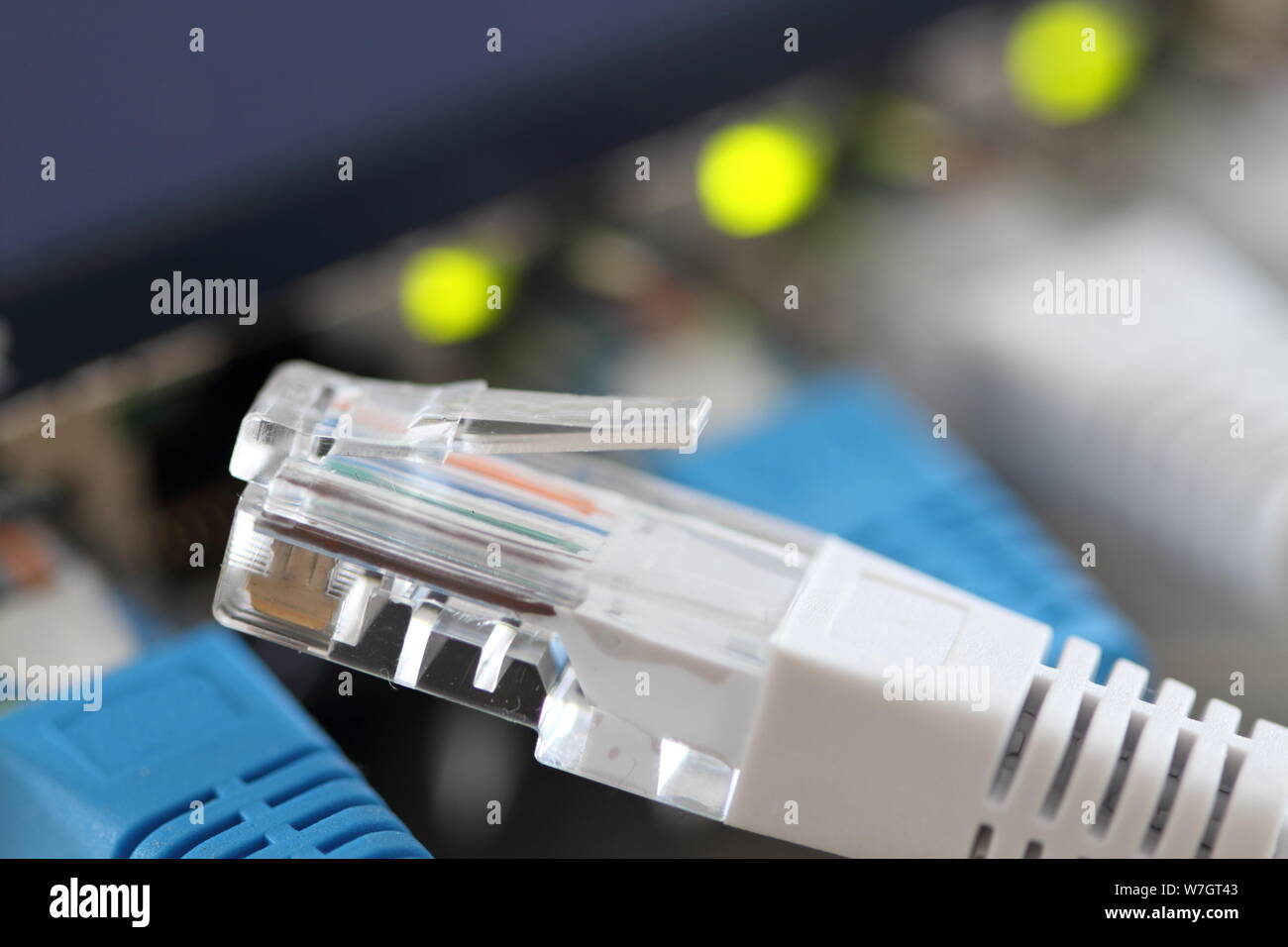 RJ45 plug in a router Stock Photo - Alamy