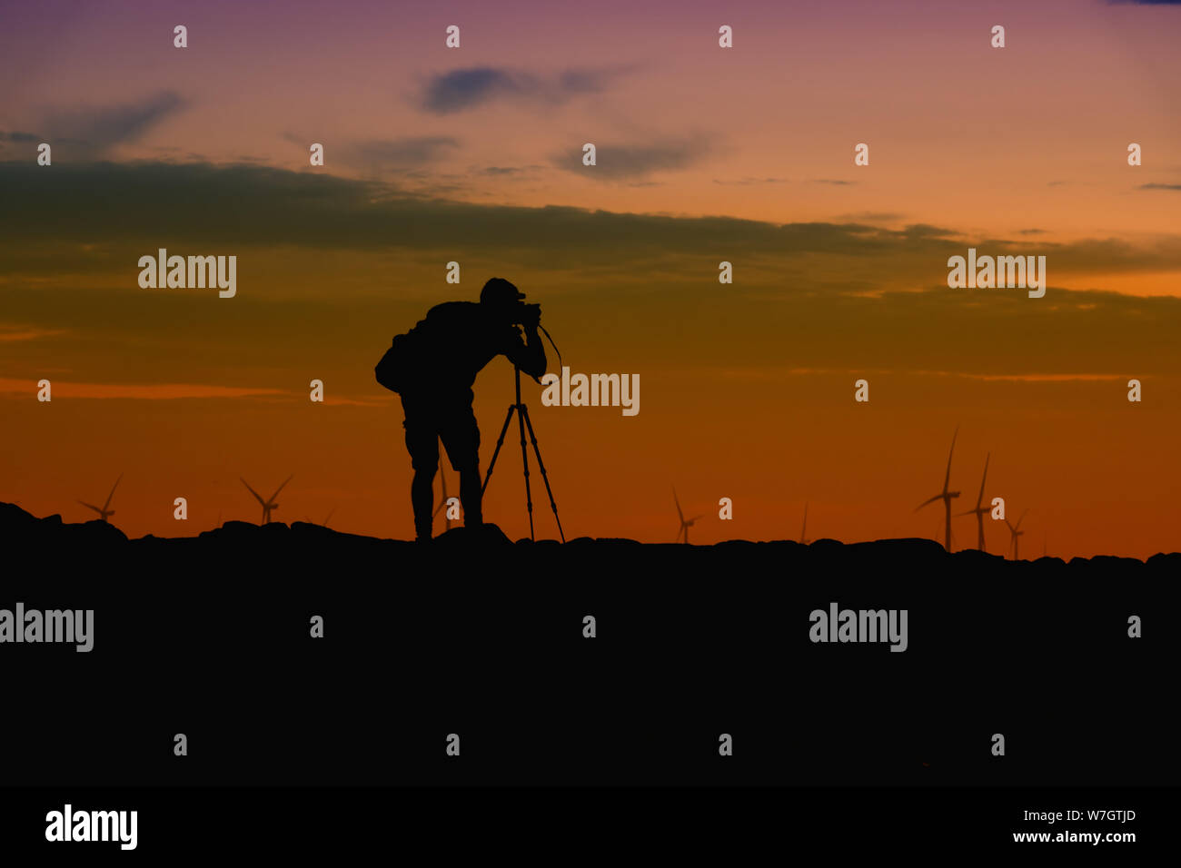 Photographer using a tripod hi-res stock photography and images - Alamy